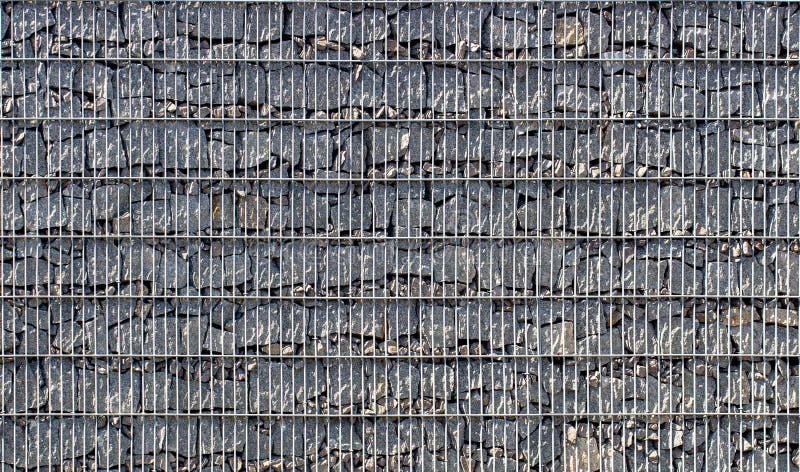 Gabion, a Stone Wall with a Metal Grid of Gray Granite Texture Stock ...