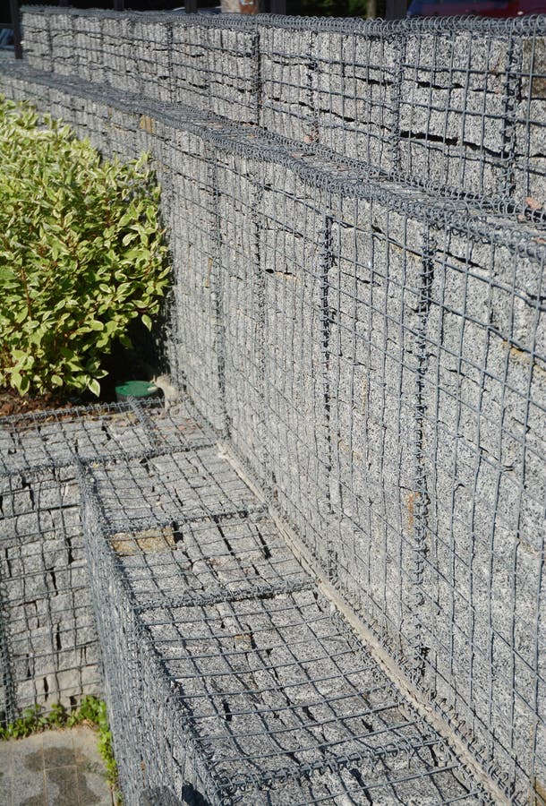 Rock Wire Mesh Retaining Wall Used To Hold Earth or Water Back Stock ...