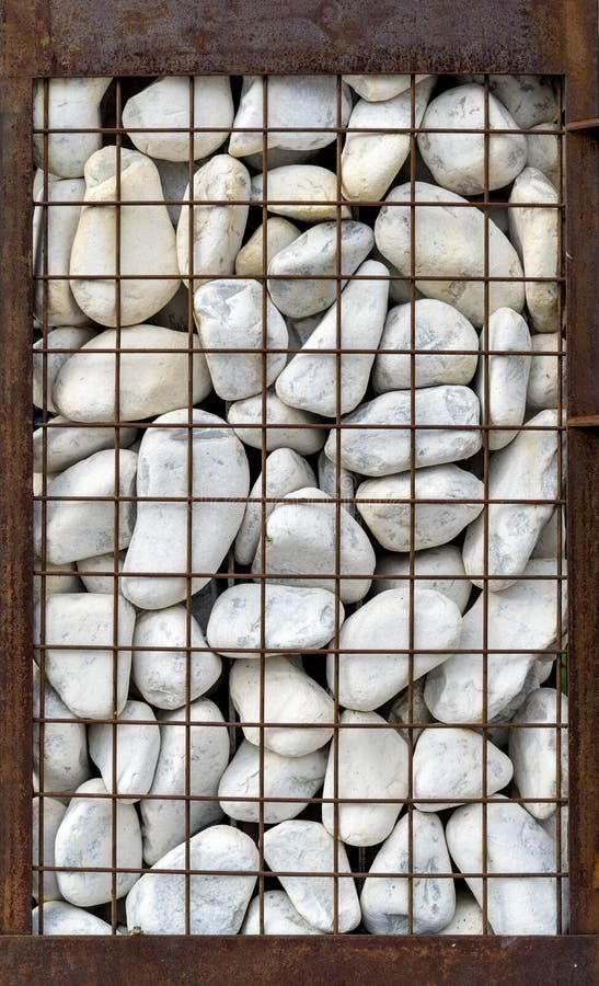 Gabion with white pebbles stock image. Image of metal - 131982121