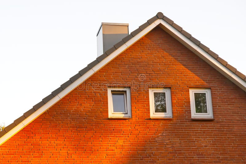 Gable End of a Brick House in Warm Sunlight Stock Image - Image of ...