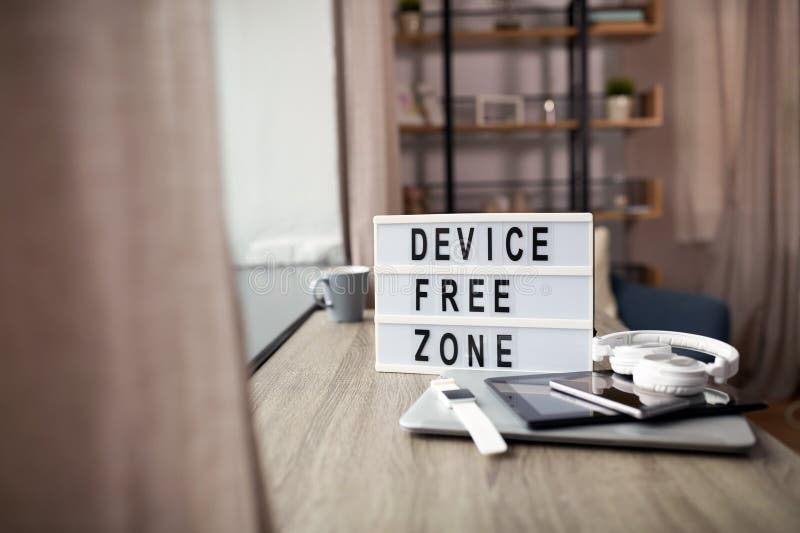 Gadgets and Device Free Zone Words on Light Box Stock Photo - Image of ...