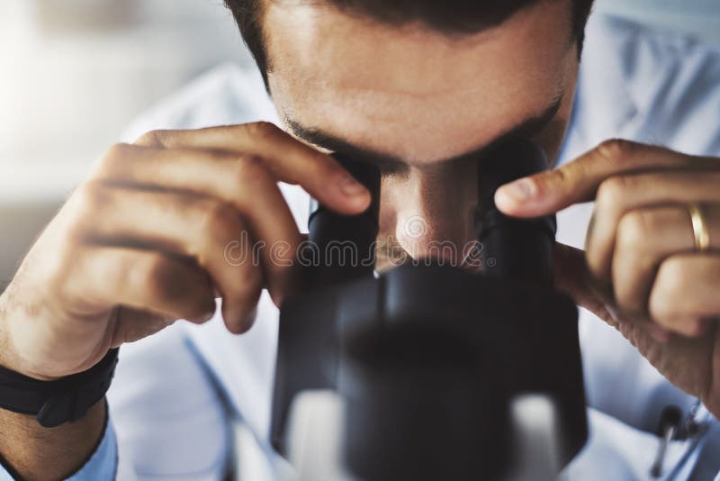 Gaining a Deeper Insight into His Research. a Scientist Using a ...