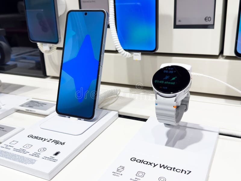 Galaxy Z Flip6 and Galaxy Watch7 Display in Electronics Store Editorial Stock Image - Image of ...