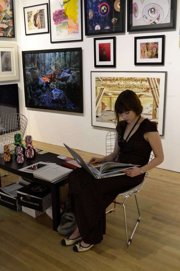 Gallery Assistant at Work editorial photography. Image of affordable ...