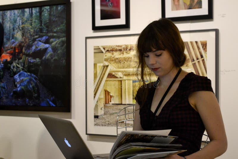 Gallery Assistant at Work editorial stock image. Image of working ...