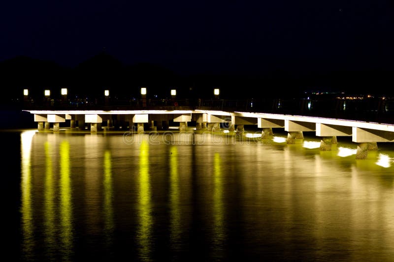 Gallery Bridge with Yellow Light Stock Photo - Image of boats, sunset ...