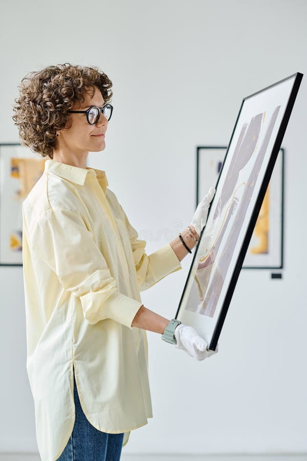 Gallery Worker Working with Modern Art Stock Image - Image of artwork ...