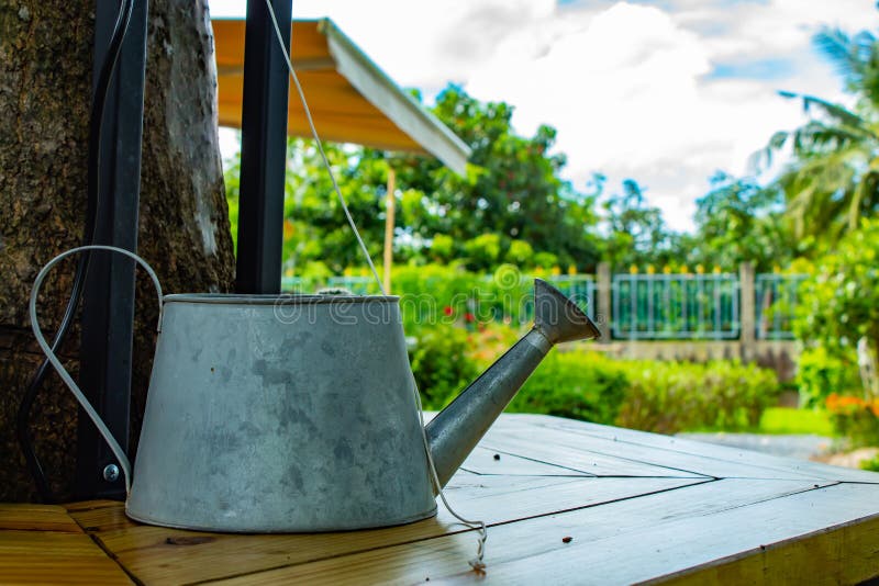 Galvanized Cans. Irrigation Water on Table. Stock Image - Image of ...
