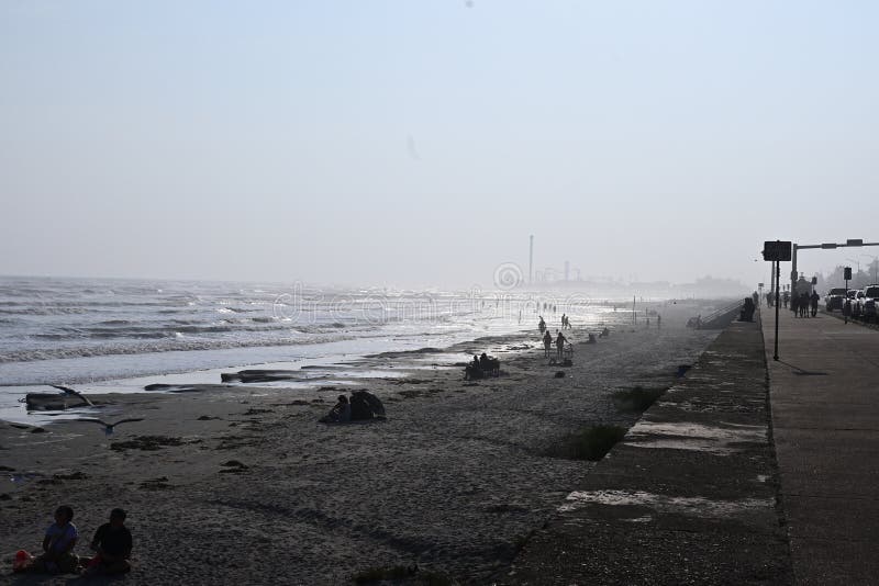 Galveston Beach in the Sandy Mist Stock Photo - Image of ocean, beach ...