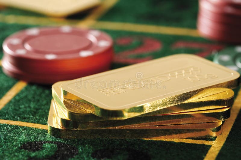 Gambling Chips and Gold Bars on Roulette Table Stock Image - Image of ...