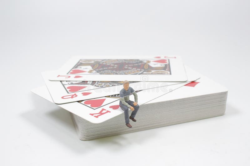 A Gambling Games, the Figure Man Sit on the Playing Card Stock Photo ...