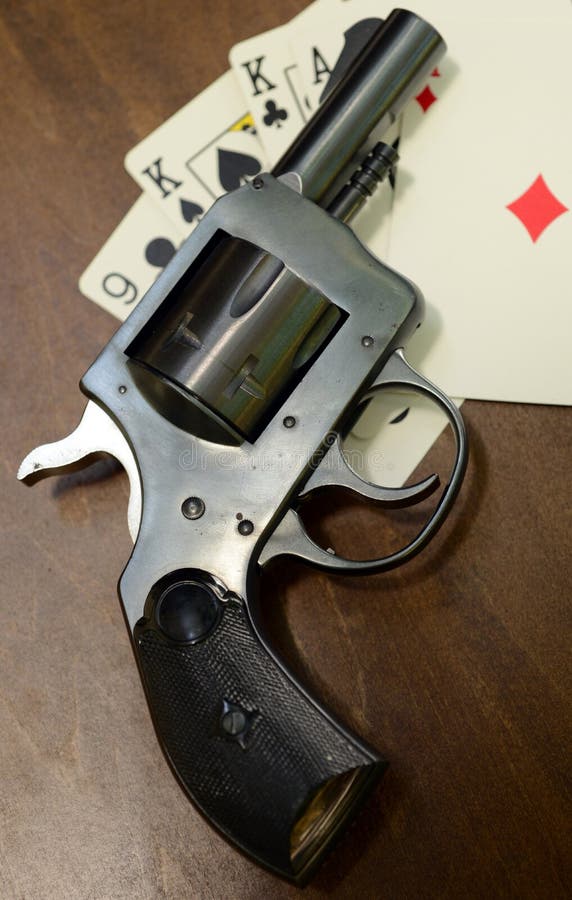 Gun and gambling stock image. Image of luck, green, casino - 109035267