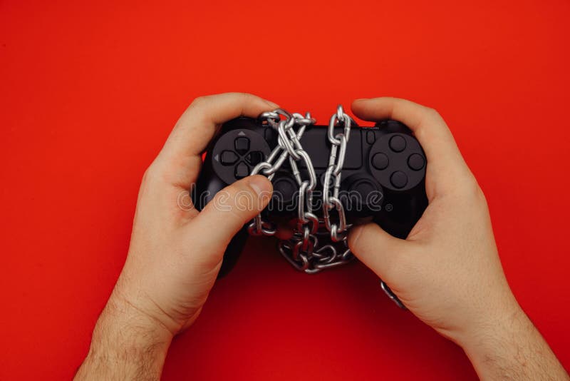 Game Addiction Concept. Hands of a Young Man Holds a Game Controller is ...
