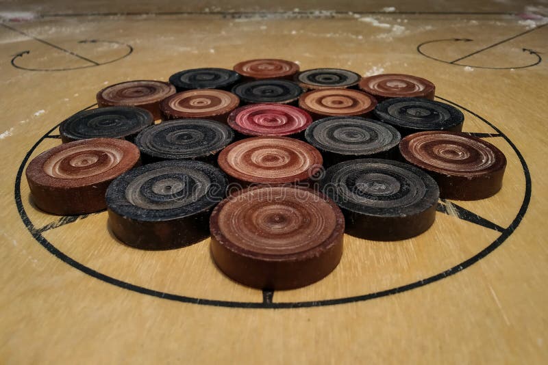 A Game of Carrom with Arranged Coins on Board Stock Photo - Image of ...