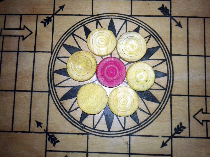 A Game of Carrom with Pieces Carrom Man on the Board Carom - Stacking ...