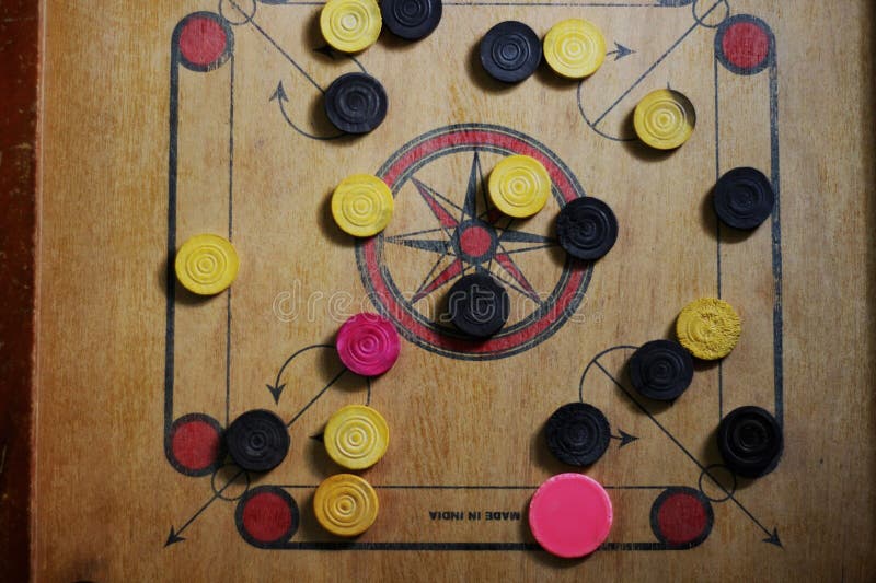 A Game Of Carrom With Pieces Carrom Man On The Board Carom - Stacking ...