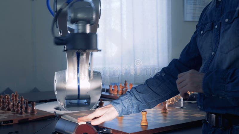 Robot and a Chess Player Playing Chess. Stock Video - Video of match ...