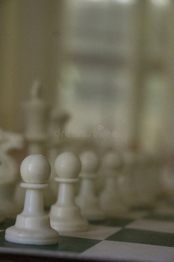 A Game of Chess in Play with Black and Ivory Pieces. Stock Photo ...