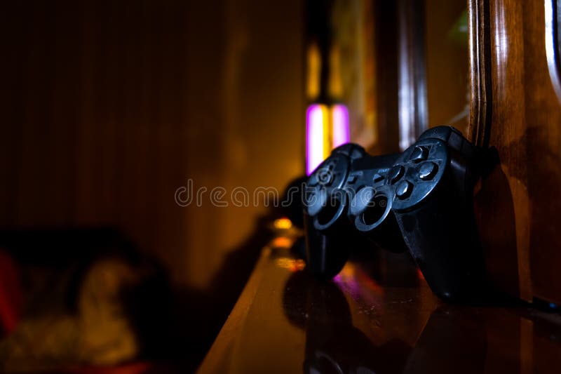 Game Controller Awaiting Action in Ambient Light Stock Image - Image of ...