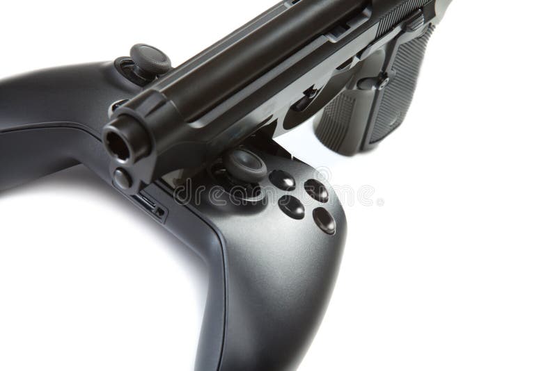 Game Controller and Handgun Near it - Studio Close Up Shot. Virtual and ...