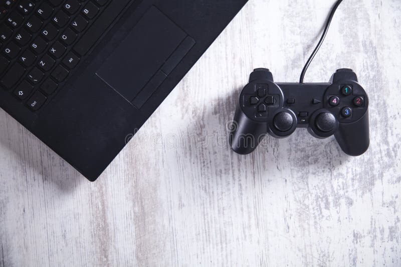 Game Controller with Laptop. Playing Video Games Stock Image - Image of ...