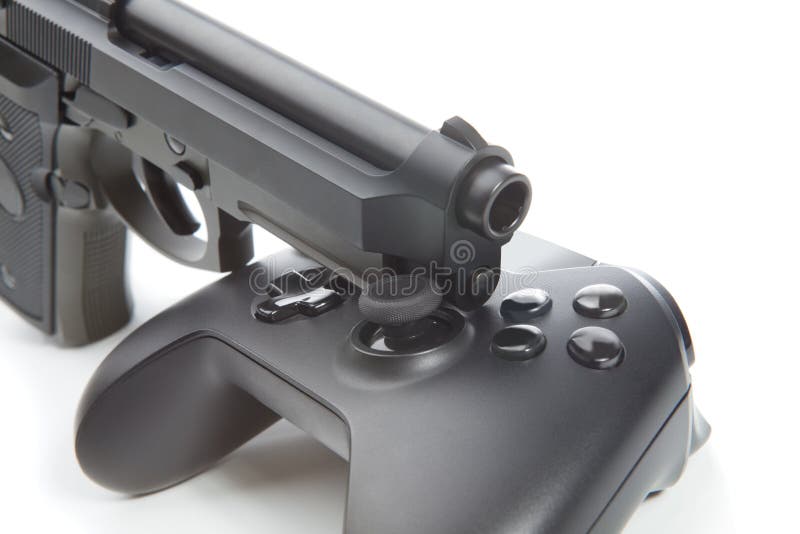 Game Controller with Real Handgun Near it - Virtual and Real Life ...