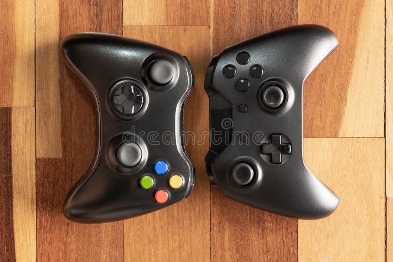 Game Controller on Wooden Floor Stock Photo - Image of black, gaming ...