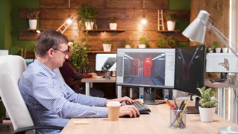 Game Creator Developing Videogame Simulation while Working at Level ...