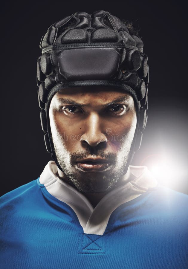 Game on. Cropped Studio Portrait of a Determined Young Rugby Player ...