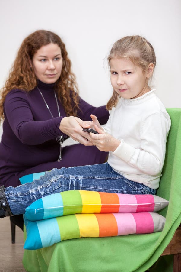 Game Dependence in Child, Mother Takes Away Smartphone Stock Photo ...