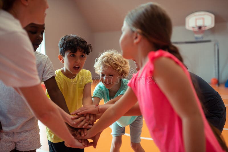 Excited Pupils Holding Hands Forming A Circle Stock Image Image Of Company Bright 152713627