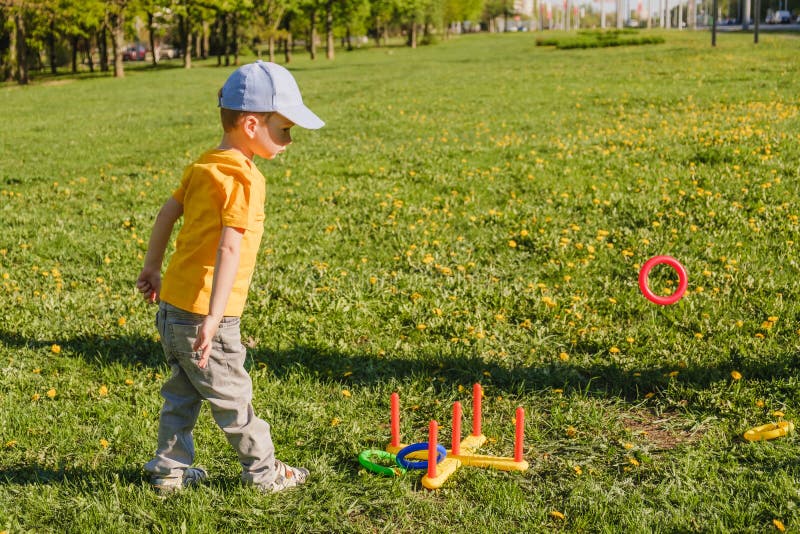 Game Kid Boy Fun Grass. Family Toss Stock Photo - Image of activity ...