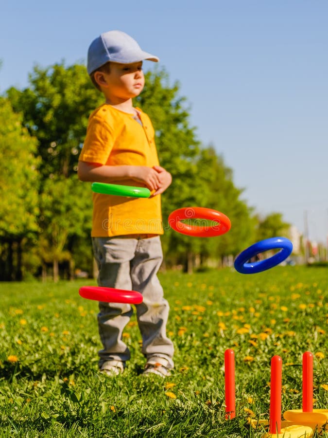 Game Kid Boy Fun Grass. Green Stock Image - Image of lawn, family ...