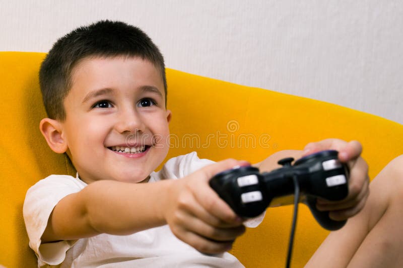 Boy Playing Video Game stock image. Image of mood, scowl - 1007523