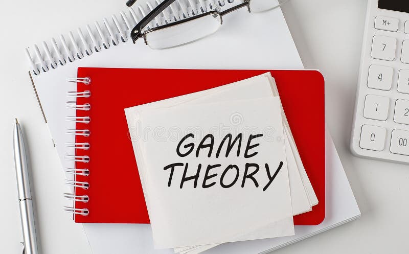 GAME THEORY Word on Sticker on Notepad with Pen and Calculator Stock ...