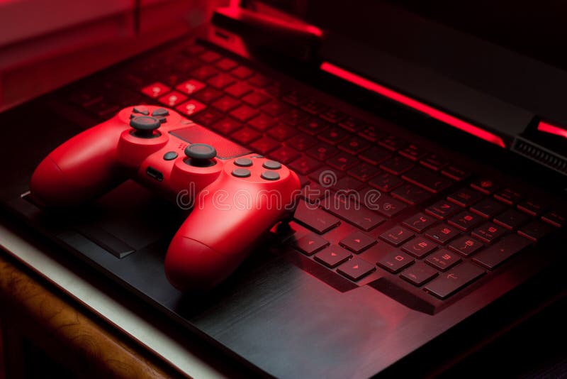 Gamepad on Computer Keyboard in the Dark. Video Game Controllers Stock ...