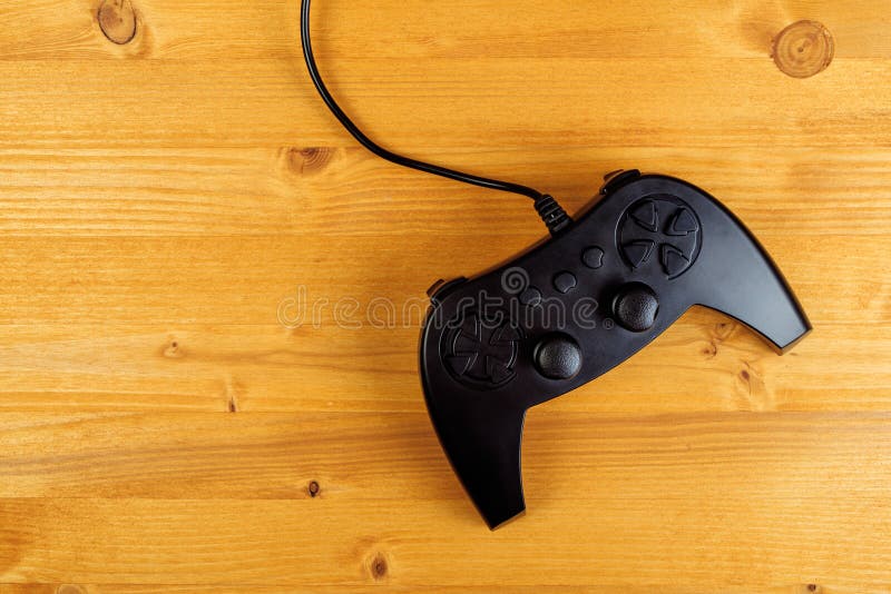 Gamepad Controller on Wooden Desk, Flat Lay Top View Stock Photo ...