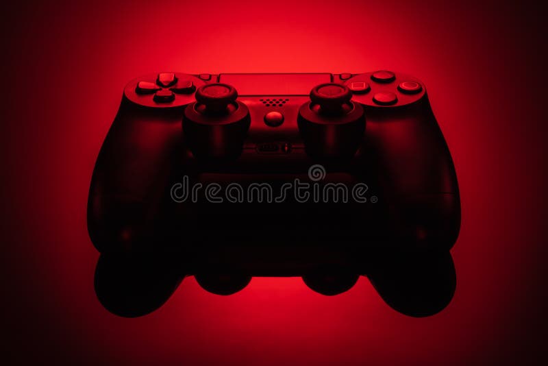 Gamepad Game Console on a Red Background Editorial Photography - Image ...
