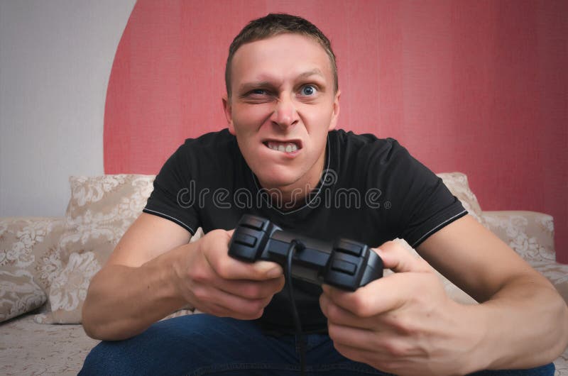 Gamer. stock photo. Image of tense, angry, gamepad, gamer - 128409854