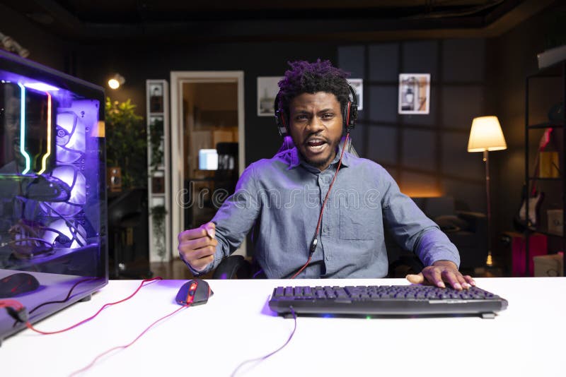 Gamer Excited after Winning Online Multiplayer Game Match on Gaming PC ...