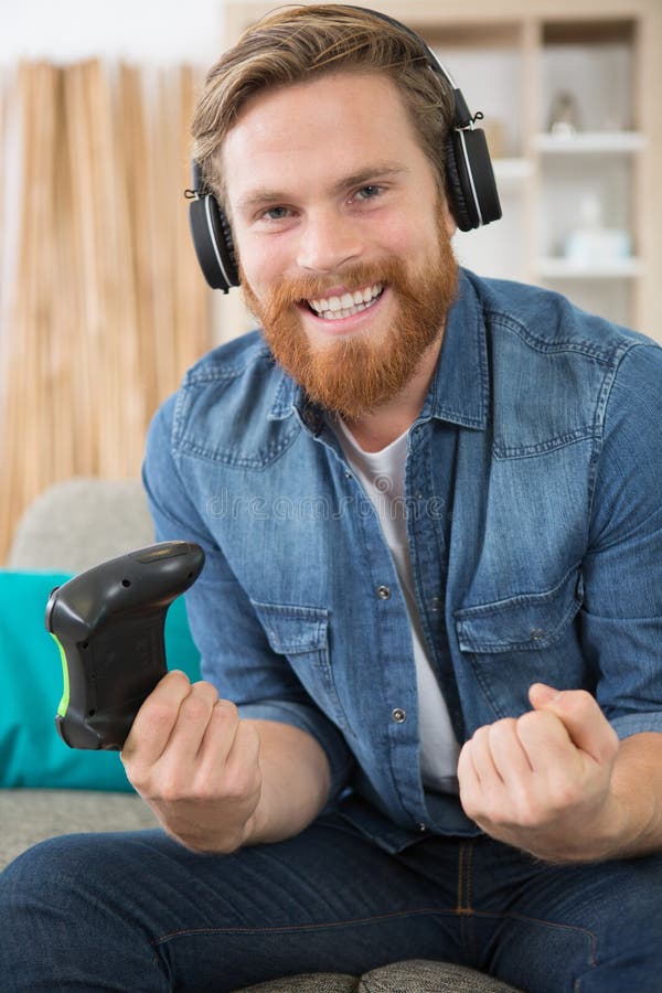 Gamer Man Playing Video Game Using Headphones Stock Photo - Image of ...