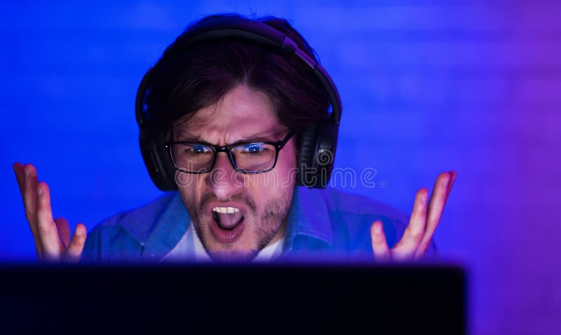 Gamer Shouting and Gesturing Having Low Internet Sitting Indoor, Low ...