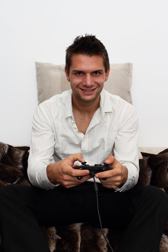 Gamer Sitting on Couch with Controller Stock Photo - Image of gaming ...