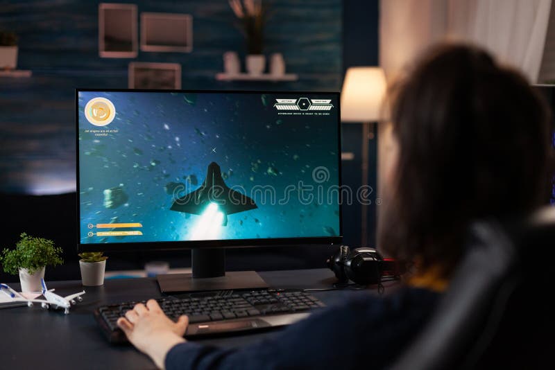 Gamer Using Keyboard To Play Digital Video Games Stock Photo - Image of ...