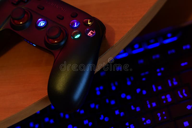 Gamesir G3s Video Game Controller and A4tech Keyboard on Office Table ...