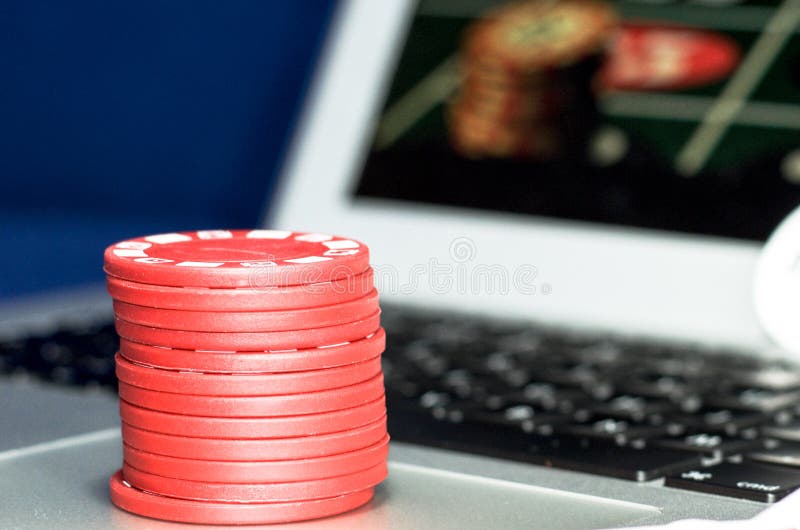 Gaming chips on laptop stock image. Image of chip, online - 80921401