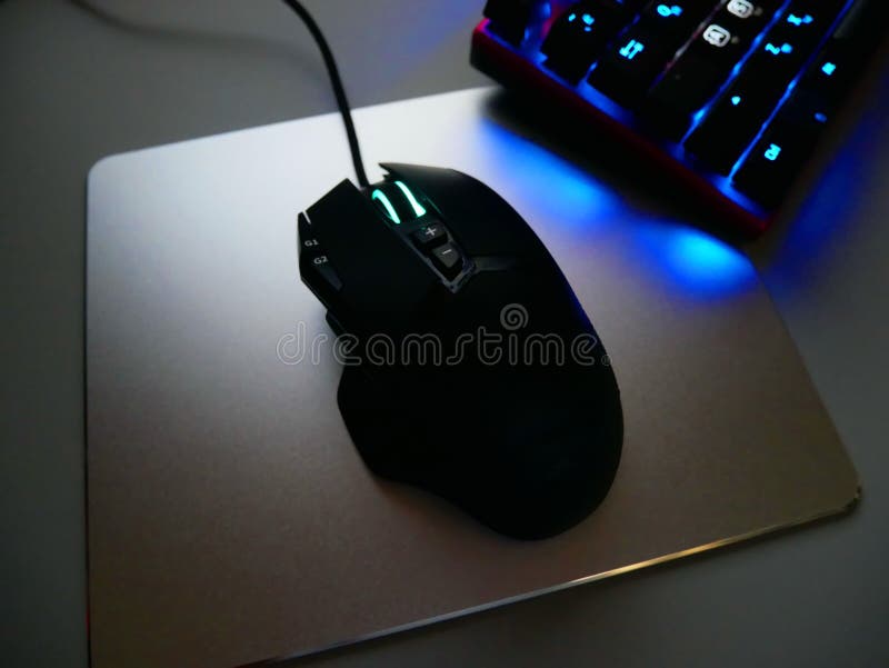 Gaming Computer Mouse with Backlight. Computer Mouse on the Desktop ...