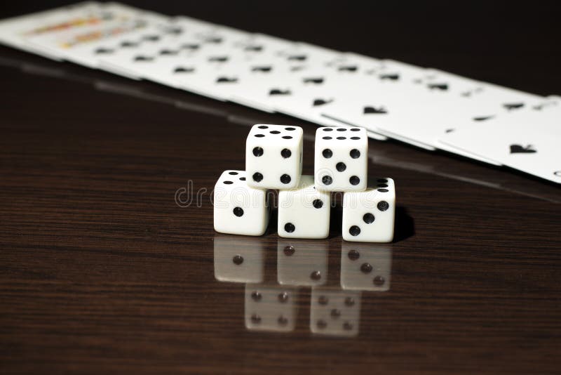 Gaming Dice and a Row of Playing Cards. Stock Image - Image of ...