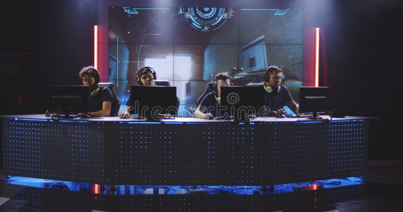 Gaming Team Playing FPS Computer Game Stock Photo - Image of teamwork ...