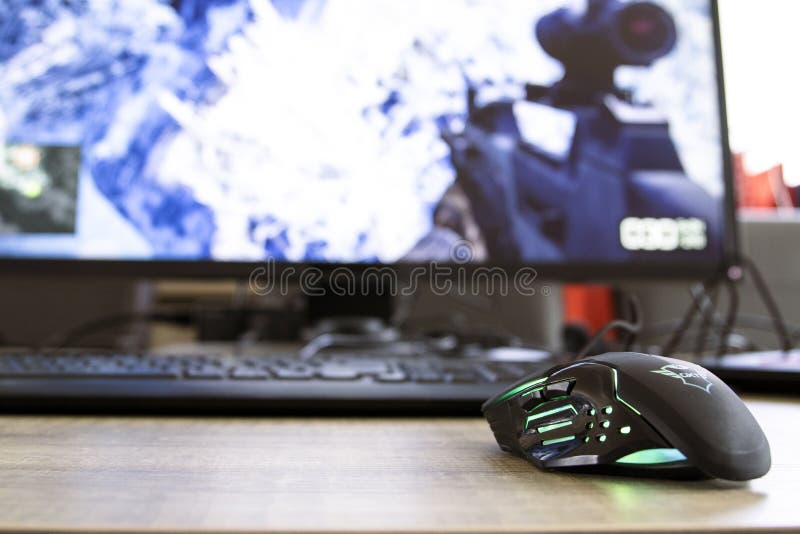 Gaming Trust Gaming Mouse in Front of a Keyboard and a PC Screen ...